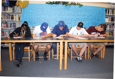 Wildcats sign five at a time