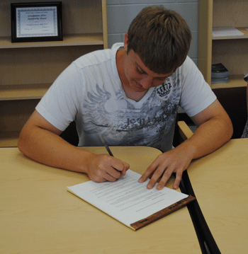 Eric Busch becomes a Hawk