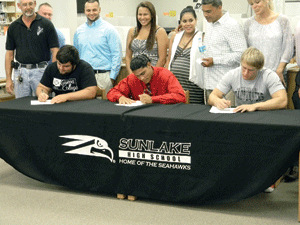 Three Sunlake football players sign